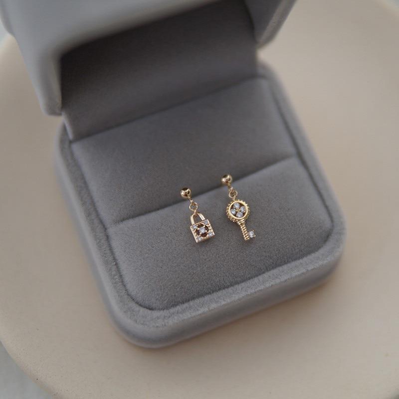 Buy HI MAN S925 Sterling Silver Asymmetric Crystal Lock Key Stud ...