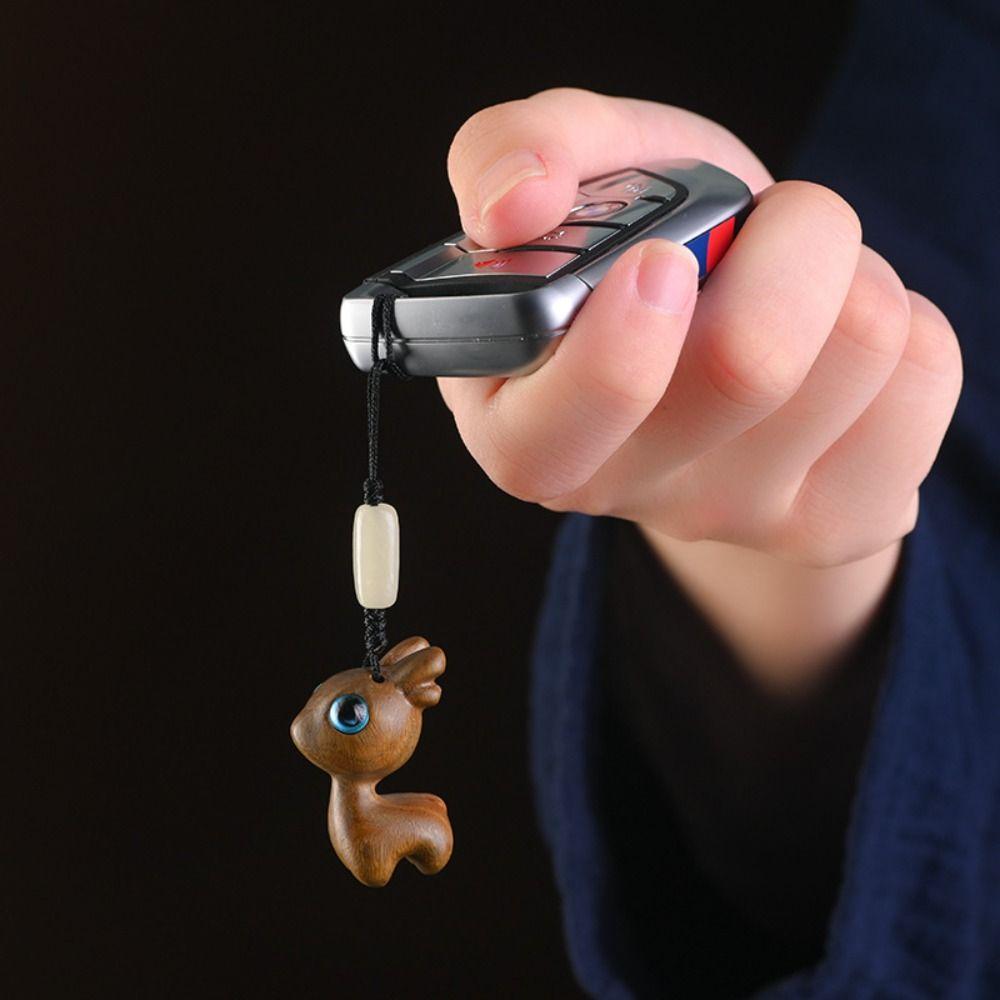 Cheap Car Key Charms Hand-woven Deer Pendant Sandalwood Key Chain Key ...