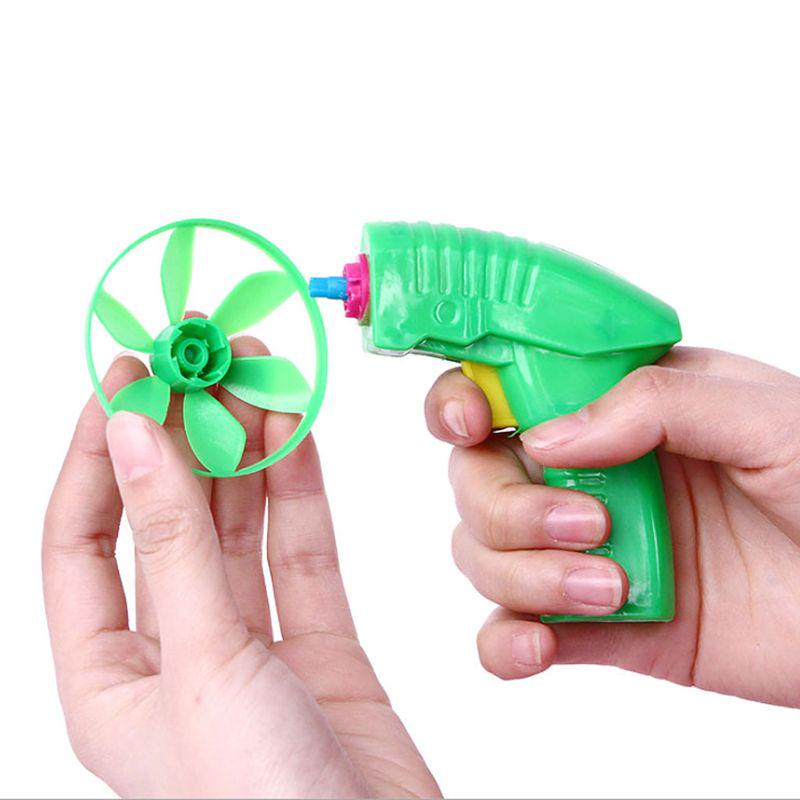 Buy Rotating Disc Kids Toys Flying Rotation Plate Pistol Plastic ...