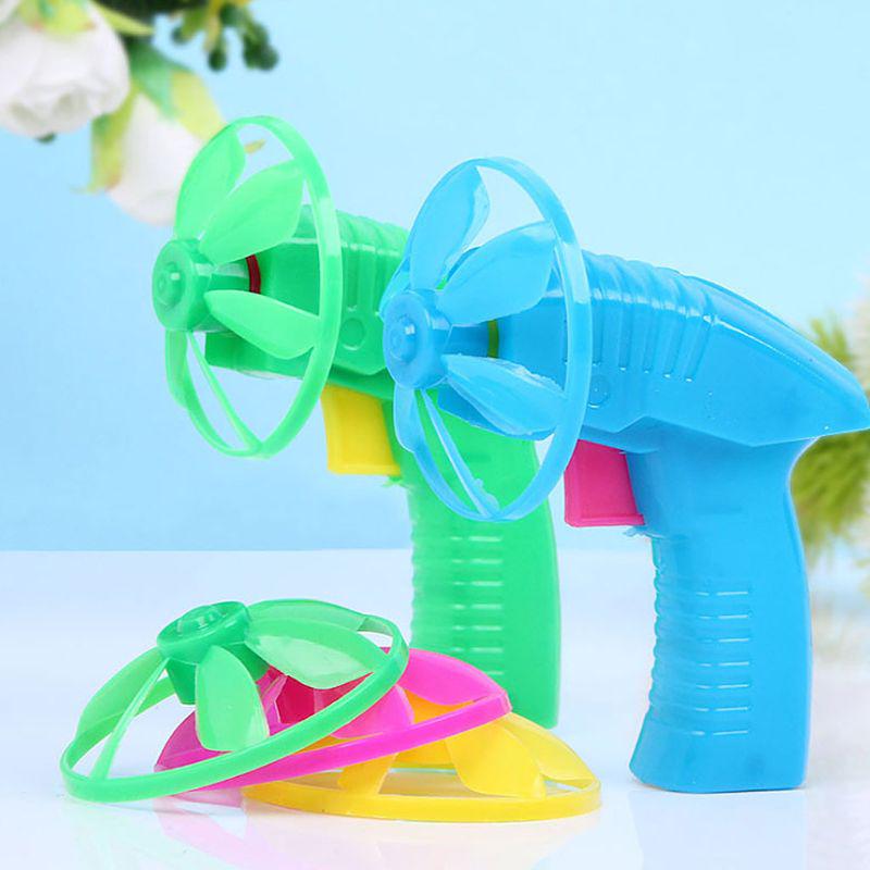 Buy Rotating Disc Kids Toys Flying Rotation Plate Pistol Plastic ...